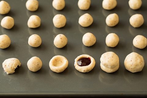 Raspberry Almond Snowball Cookies (jam stuffed snowballs) - Cooking Classy